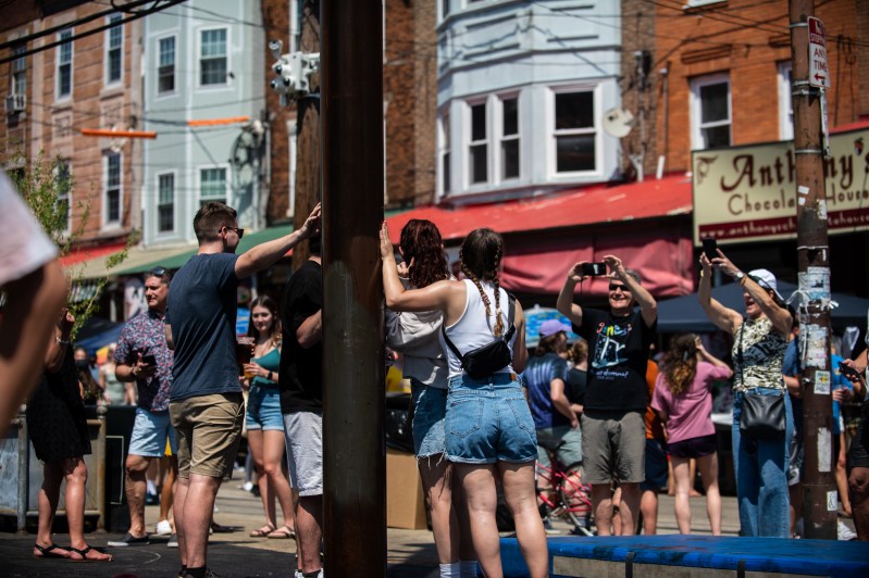 Philadelphia tradition: Grease pole competition at Italian Market ...