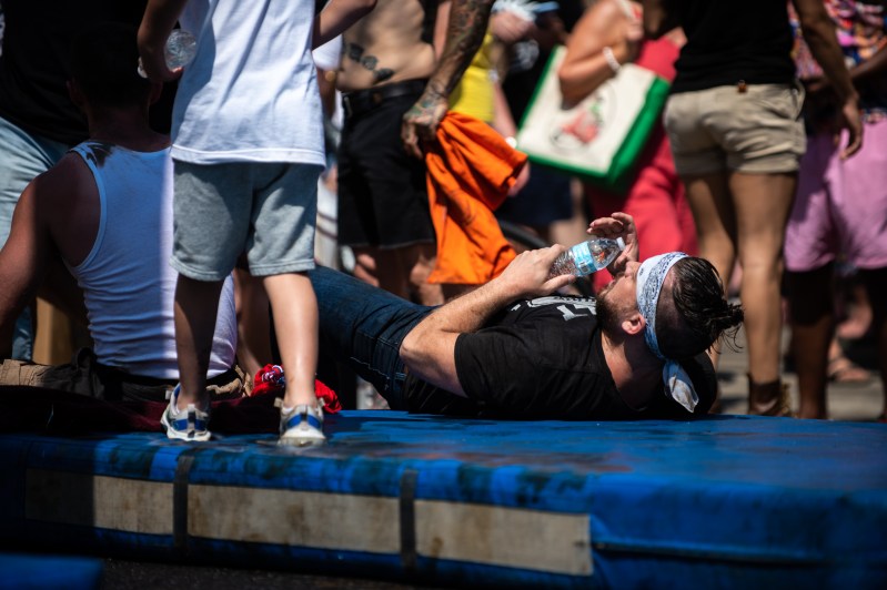 Philadelphia tradition: Grease pole competition at Italian Market ...
